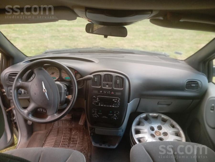 Pelēks Chrysler Voyager 2004 Liepāja, ar dzinēja tilpumu 2.80 L un nobraukumu 440 tūkst. km par 1100 €, foto 11 vietnē AUTOMOTO.COM.LV