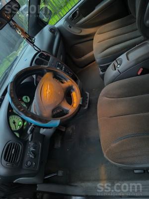 Pelēks Chrysler Voyager 2006 Ogre, ar dzinēja tilpumu 2.80 L un nobraukumu 294 tūkst. km par 650 €, foto 8 vietnē AUTOMOTO.COM.LV