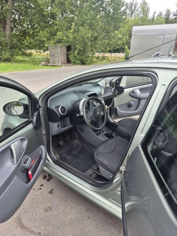Green Citroen C1 2011 in Jonava, with an engine capacity of 1.00 L and mileage of 207 thousand km for 1150 €, photo 5 on AUTOMOTO.COM.LV