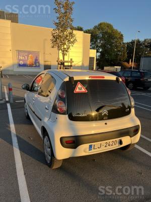 White Citroen C1 2014 in Riga, with an engine capacity of 1.00 L and mileage of 101 thousand km for 2700 €, photo 7 on AUTOMOTO.COM.LV
