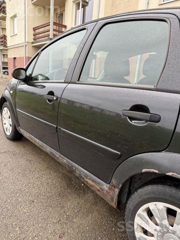 Black Citroen C3 2006 in Riga, with an engine capacity of 1.60 L and mileage of 220 thousand km for 350 €, photo 3 on AUTOMOTO.COM.LV