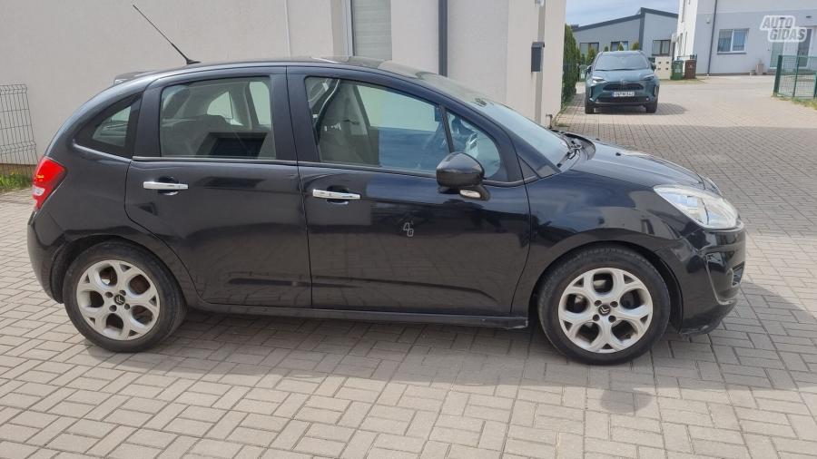 Black Citroen C3 2012 in Kaunas, with an engine capacity of 1.40 L and mileage of 182 thousand km for 2900 €, photo 4 on AUTOMOTO.COM.LV