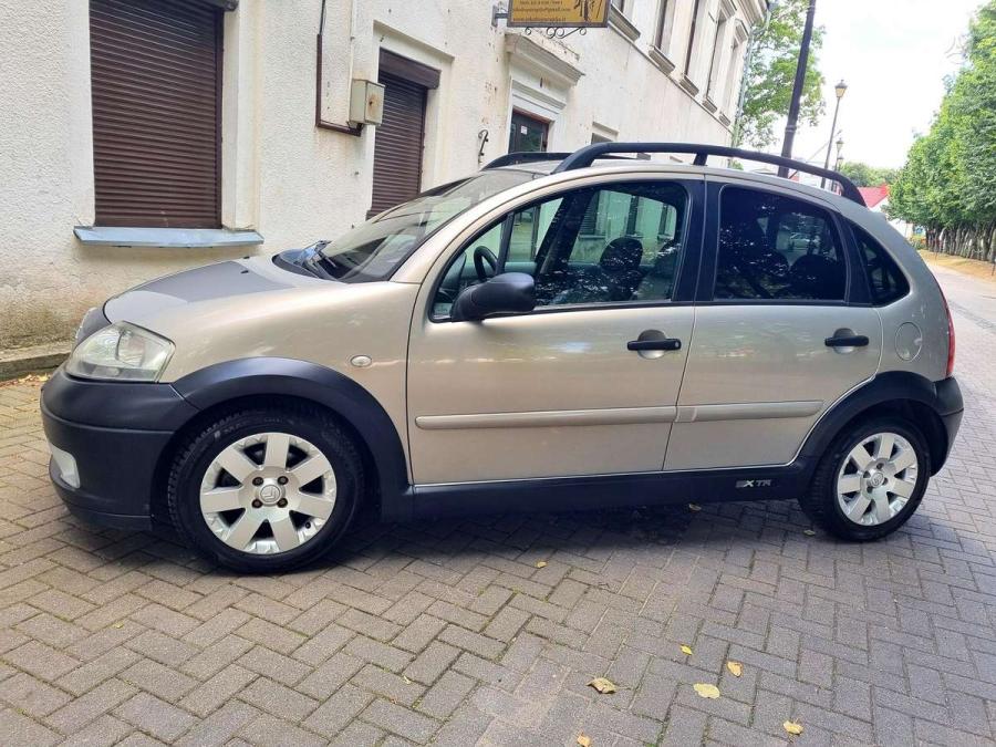 Brown Citroen C3 2005 in Jonava, with an engine capacity of 1.40 L and mileage of 118 thousand km for 1499 €, photo 18 on AUTOMOTO.COM.LV