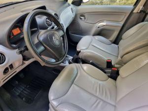 Brown Citroen C3 2005 in Jonava, with an engine capacity of 1.40 L and mileage of 118 thousand km for 1499 €, photo 21 on AUTOMOTO.COM.LV