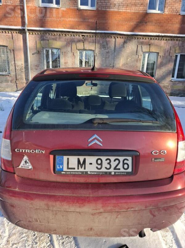 Red Citroen C3 2009 in Riga, with an engine capacity of 1.40 L and mileage of 204 thousand km for 1200 €, photo 1 on AUTOMOTO.COM.LV