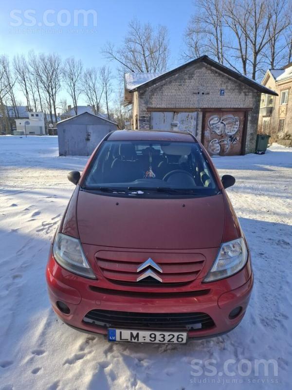 Red Citroen C3 2009 in Riga, with an engine capacity of 1.40 L and mileage of 204 thousand km for 1200 €, photo 2 on AUTOMOTO.COM.LV