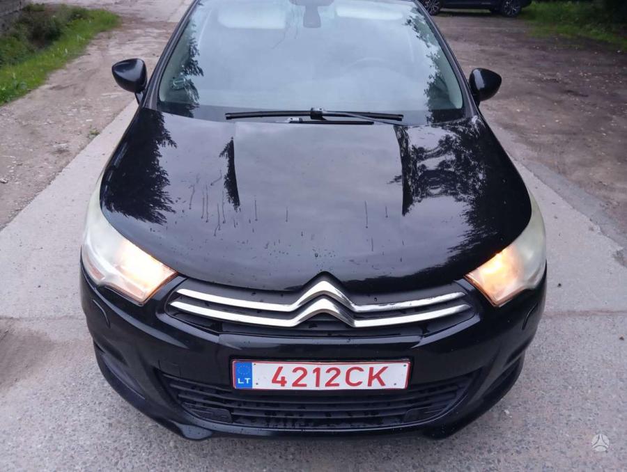 Black Citroen C4 2012 in Vilnius, with an engine capacity of 1.56 L and mileage of 260 thousand km for 1999 €, photo 1 on AUTOMOTO.COM.LV