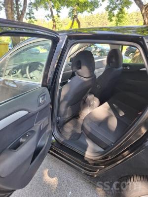 Black Citroen C4 2013 in Riga, with an engine capacity of 1.60 L and mileage of 205 thousand km for 4999 €, photo 12 on AUTOMOTO.COM.LV