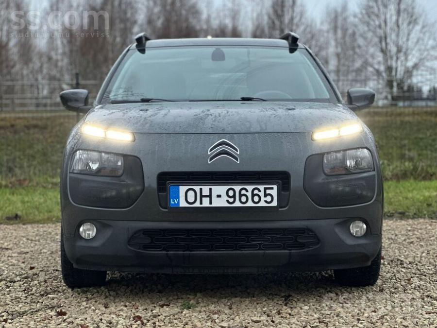 Black Citroen C4 Cactus 2015 in Jelgava, with an engine capacity of 1.20 L and mileage of 0 thousand km for 6400 €, photo 3 on AUTOMOTO.COM.LV