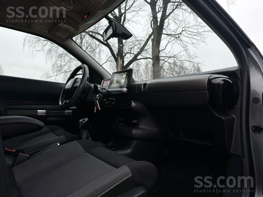 Black Citroen C4 Cactus 2015 in Jelgava, with an engine capacity of 1.20 L and mileage of 0 thousand km for 6400 €, photo 11 on AUTOMOTO.COM.LV