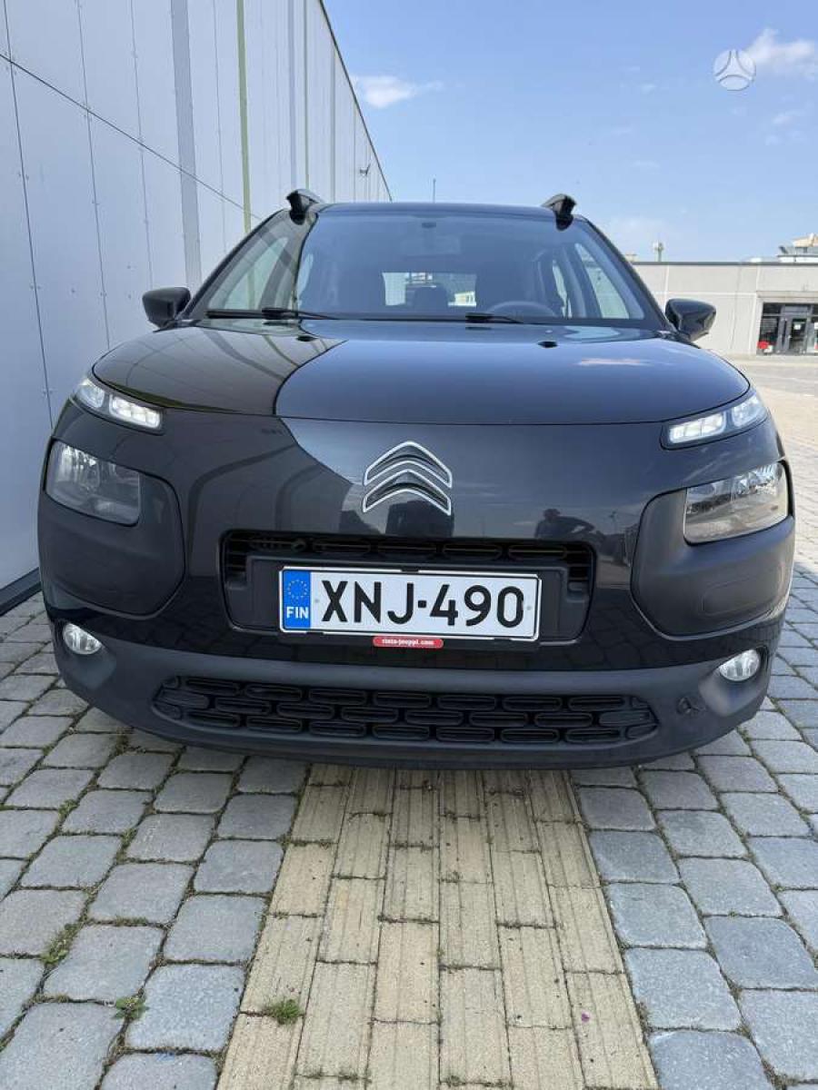 Melns Citroen C4 Cactus 2015 Raseiniai, ar dzinēja tilpumu 1.20 L un nobraukumu 149 tūkst. km par 3999 €, foto 7 vietnē AUTOMOTO.COM.LV