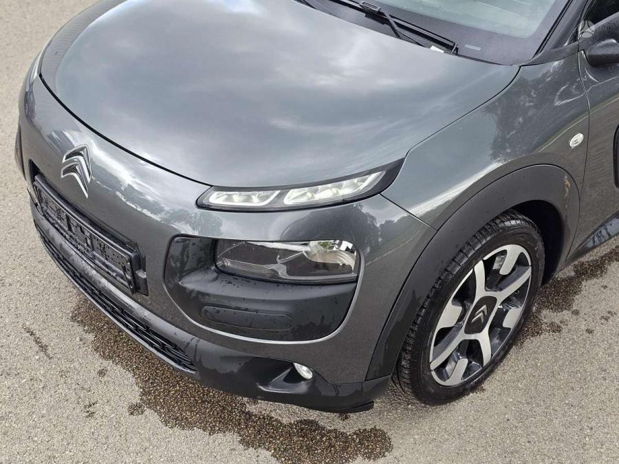Black Citroen C4 Cactus 2017 in Rokiskis, with an engine capacity of 1.56 L and mileage of 120 thousand km for 4150 €, photo 8 on AUTOMOTO.COM.LV