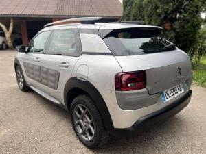 Grey Citroen C4 Cactus 2014 in Taurage, with an engine capacity of 1.20 L and mileage of 142 thousand km for 4400 €, photo 5 on AUTOMOTO.COM.LV