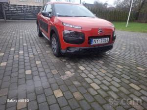 Red Citroen C4 Cactus 2015 in Cesis, with an engine capacity of 1.20 L and mileage of 167 thousand km for 5250 €, photo 5 on AUTOMOTO.COM.LV
