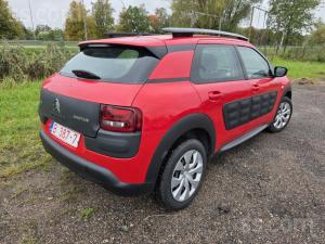 Red Citroen C4 Cactus 2015 in Ogre, with an engine capacity of 1.20 L and mileage of 128 thousand km for 4990 €, photo 7 on AUTOMOTO.COM.LV