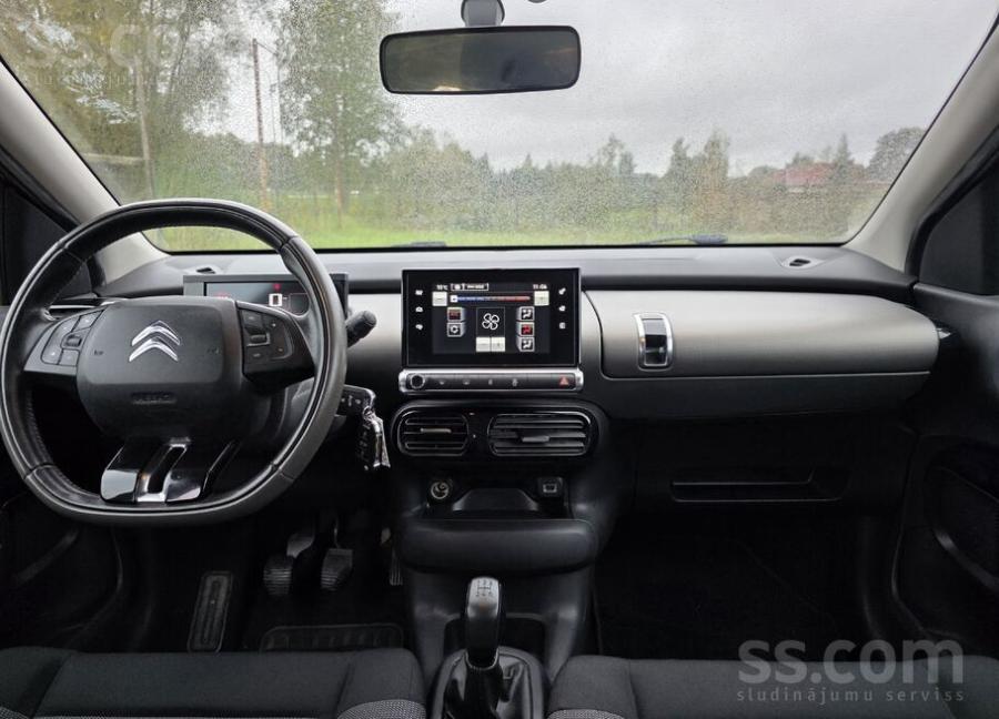 Red Citroen C4 Cactus 2015 in Ogre, with an engine capacity of 1.20 L and mileage of 128 thousand km for 4990 €, photo 13 on AUTOMOTO.COM.LV
