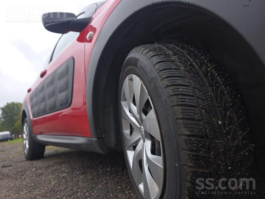 Red Citroen C4 Cactus 2015 in Ogre, with an engine capacity of 1.20 L and mileage of 128 thousand km for 4990 €, photo 16 on AUTOMOTO.COM.LV