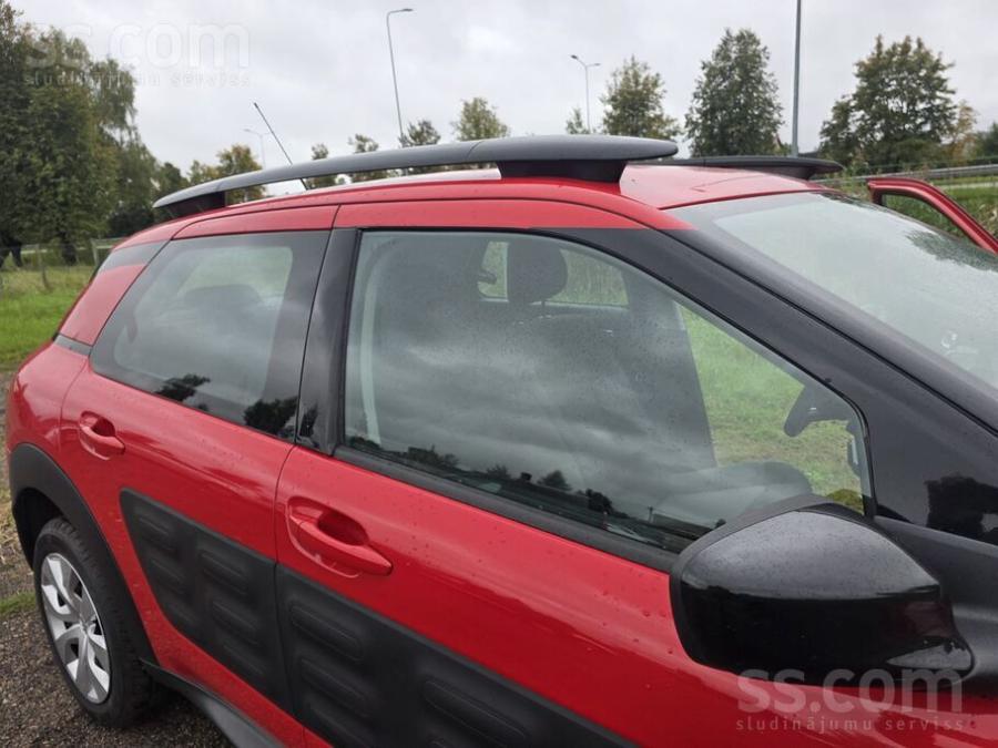 Red Citroen C4 Cactus 2015 in Ogre, with an engine capacity of 1.20 L and mileage of 128 thousand km for 4990 €, photo 19 on AUTOMOTO.COM.LV