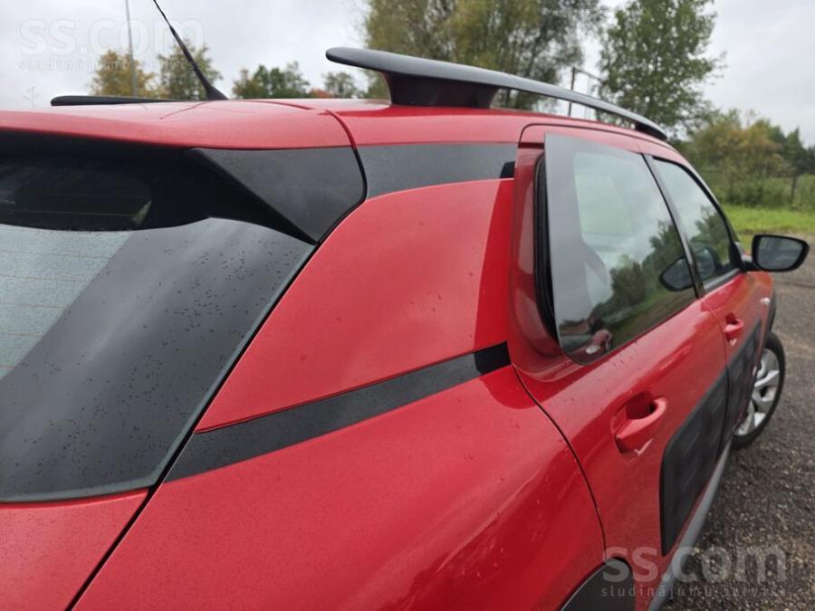 Red Citroen C4 Cactus 2015 in Ogre, with an engine capacity of 1.20 L and mileage of 128 thousand km for 4990 €, photo 20 on AUTOMOTO.COM.LV