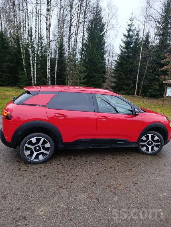 Red Citroen C4 Cactus 2019 in Riga, with an engine capacity of 1.20 L and mileage of 131 thousand km for 9500 €, photo 3 on AUTOMOTO.COM.LV
