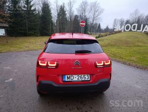 Red Citroen C4 Cactus 2019 in Riga, with an engine capacity of 1.20 L and mileage of 131 thousand km for 9500 €, photo 4 on AUTOMOTO.COM.LV