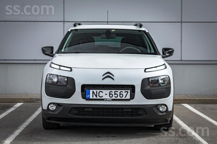White Citroen C4 Cactus 2015 in Riga, with an engine capacity of 1.60 L and mileage of 0 thousand km for 5950 €, photo 3 on AUTOMOTO.COM.LV