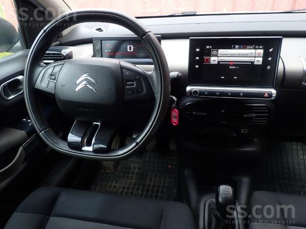 White Citroen C4 Cactus 2015 in Liepaja, with an engine capacity of 1.20 L and mileage of 149 thousand km for 4950 €, photo 7 on AUTOMOTO.COM.LV