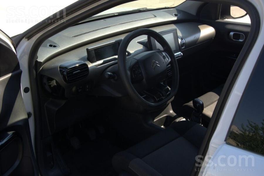 White Citroen C4 Cactus 2014 in Riga, with an engine capacity of 1.20 L and mileage of 214 thousand km for 4350 €, photo 5 on AUTOMOTO.COM.LV