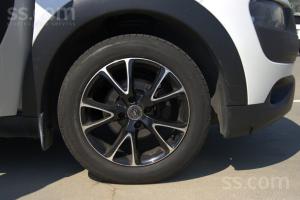 White Citroen C4 Cactus 2014 in Riga, with an engine capacity of 1.20 L and mileage of 214 thousand km for 4350 €, photo 9 on AUTOMOTO.COM.LV