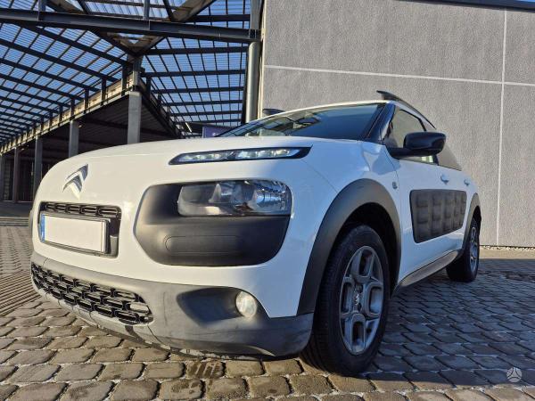 White Citroen C4 Cactus 2015 in Raseiniai, with an engine capacity of 1.20 L and mileage of 142 thousand km for 4999 €, photo 5 on AUTOMOTO.COM.LV