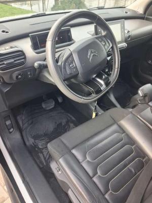 White Citroen C4 Cactus 2015 in Raseiniai, with an engine capacity of 1.56 L and mileage of 136 thousand km for 4300 €, photo 20 on AUTOMOTO.COM.LV