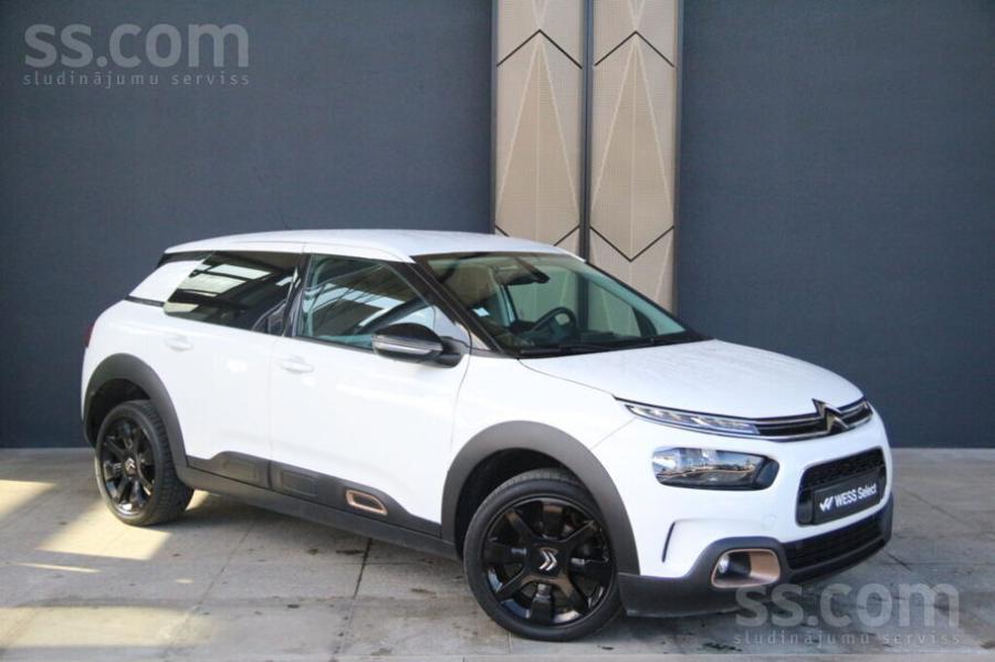 White Citroen C4 Cactus 2019 in Riga, with an engine capacity of 1.20 L and mileage of 129 thousand km for 5990 €, photo 4 on AUTOMOTO.COM.LV