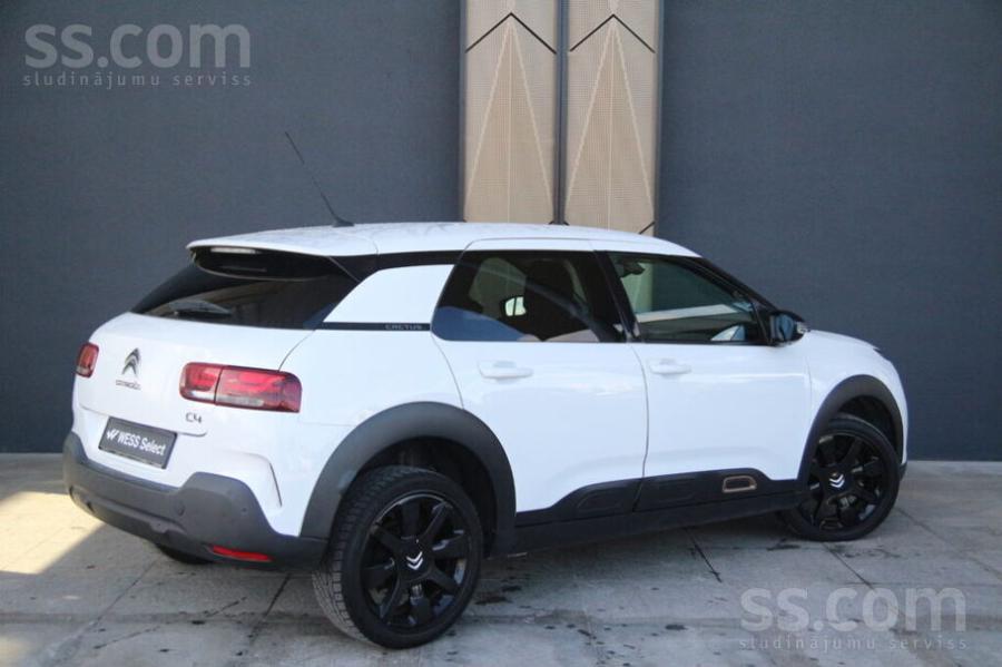 White Citroen C4 Cactus 2019 in Riga, with an engine capacity of 1.20 L and mileage of 129 thousand km for 5990 €, photo 5 on AUTOMOTO.COM.LV