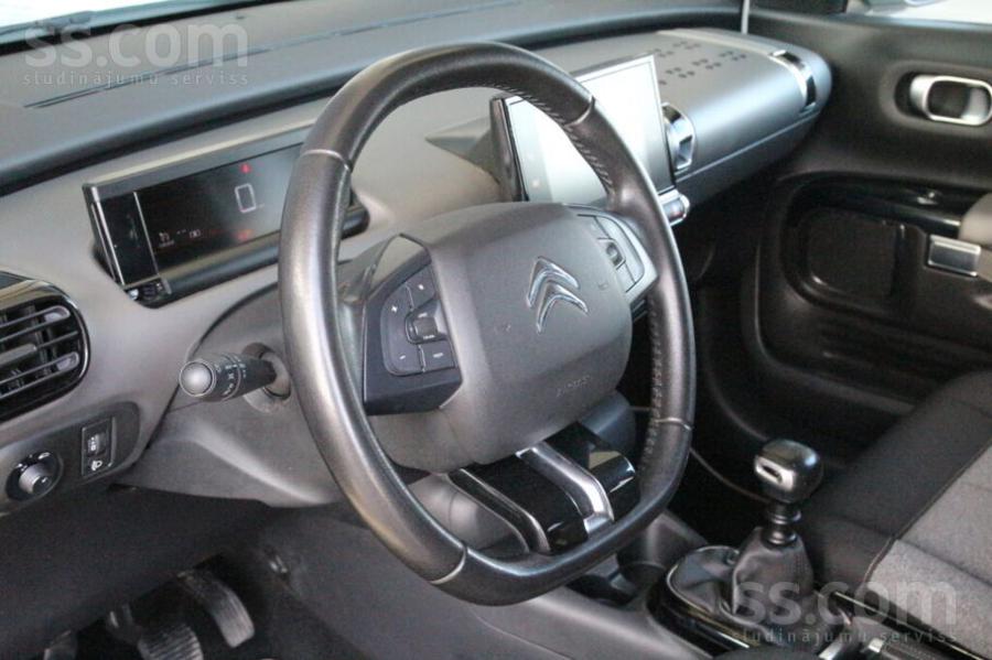 White Citroen C4 Cactus 2019 in Riga, with an engine capacity of 1.20 L and mileage of 129 thousand km for 5990 €, photo 12 on AUTOMOTO.COM.LV