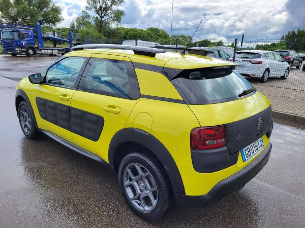Dzeltens Citroen C4 Cactus 2015 Tauragė, ar dzinēja tilpumu 1.20 L un nobraukumu 118 tūkst. km par 4500 €, foto 4 vietnē AUTOMOTO.COM.LV