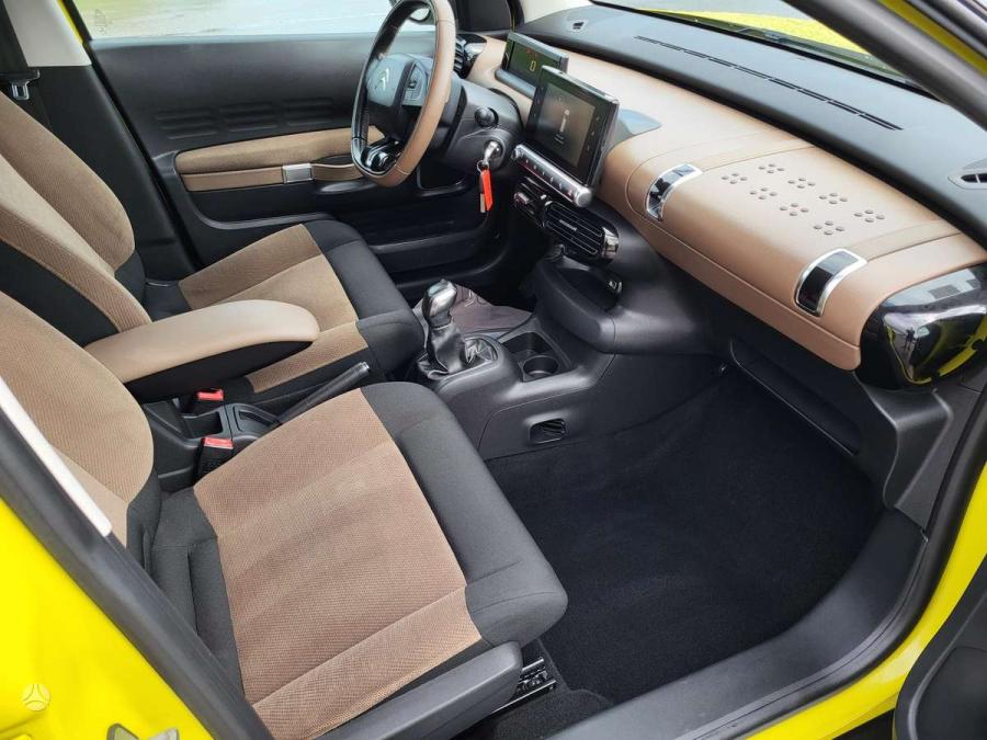 Yellow Citroen C4 Cactus 2015 in Taurage, with an engine capacity of 1.20 L and mileage of 118 thousand km for 4500 €, photo 14 on AUTOMOTO.COM.LV