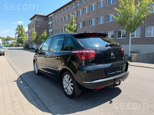 Black Citroen c4-picasso 2009 in Ogre, with an engine capacity of 2.00 L and mileage of 263 thousand km for 3599 €, photo 3 on AUTOMOTO.COM.LV