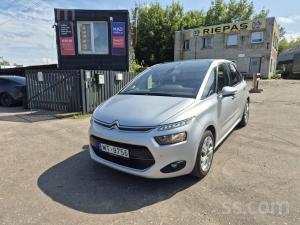 Grey Citroen c4-picasso 2015 in Riga, with an engine capacity of 2.00 L and mileage of 228 thousand km for 6890 €, photo  on AUTOMOTO.COM.LV