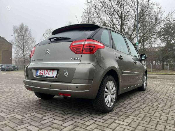 Yellow Citroen c4-picasso 2010 in Trakai, with an engine capacity of 1.56 L and mileage of 242 thousand km for 2590 €, photo 6 on AUTOMOTO.COM.LV