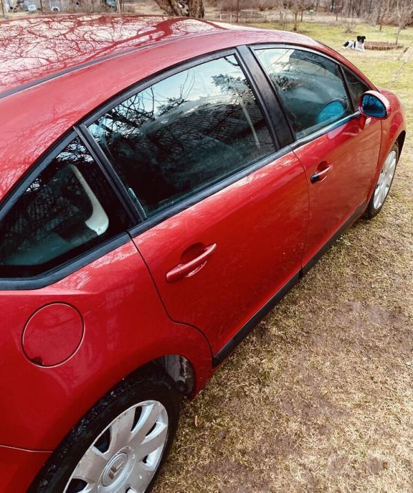 Red Citroen C4 2005 in Riga, with an engine capacity of 1.60 L and mileage of 236 thousand km for 900 €, photo 3 on AUTOMOTO.COM.LV