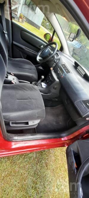 Red Citroen C4 2008 in Talsi, with an engine capacity of 1.60 L and mileage of 352 thousand km for 998 €, photo 5 on AUTOMOTO.COM.LV