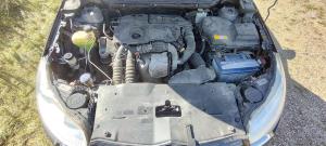 Black Citroen C5 2012 in Vilnius, with an engine capacity of 1.60 L and mileage of 225 thousand km for 2890 €, photo 13 on AUTOMOTO.COM.LV