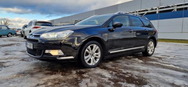 Black Citroen C5 2013 in Riga, with an engine capacity of 2.00 L and mileage of 241 thousand km for 5850 €, photo 1 on AUTOMOTO.COM.LV