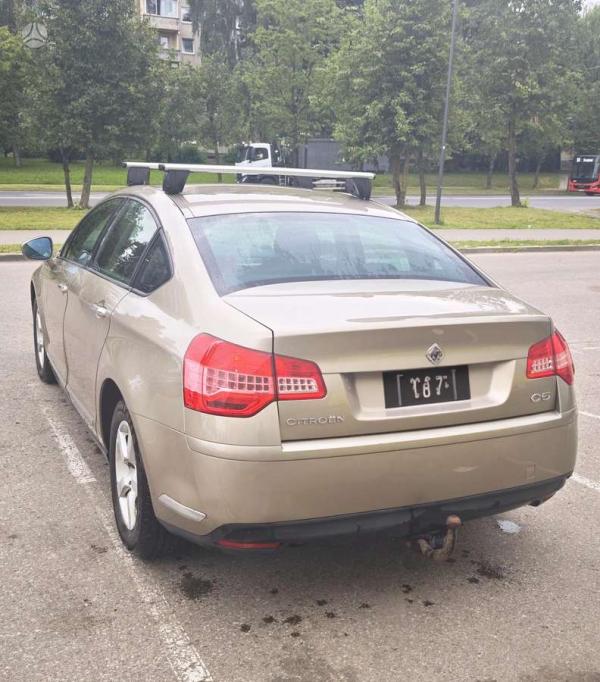 Yellow Citroen C5 2009 in Kaunas, with an engine capacity of 1.56 L and mileage of 251 thousand km for 2499 €, photo 5 on AUTOMOTO.COM.LV