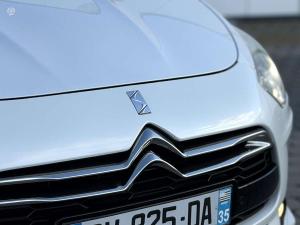 White Citroen DS5 2013 in Taurage, with an engine capacity of 2.00 L and mileage of 226 thousand km for 5800 €, photo 14 on AUTOMOTO.COM.LV