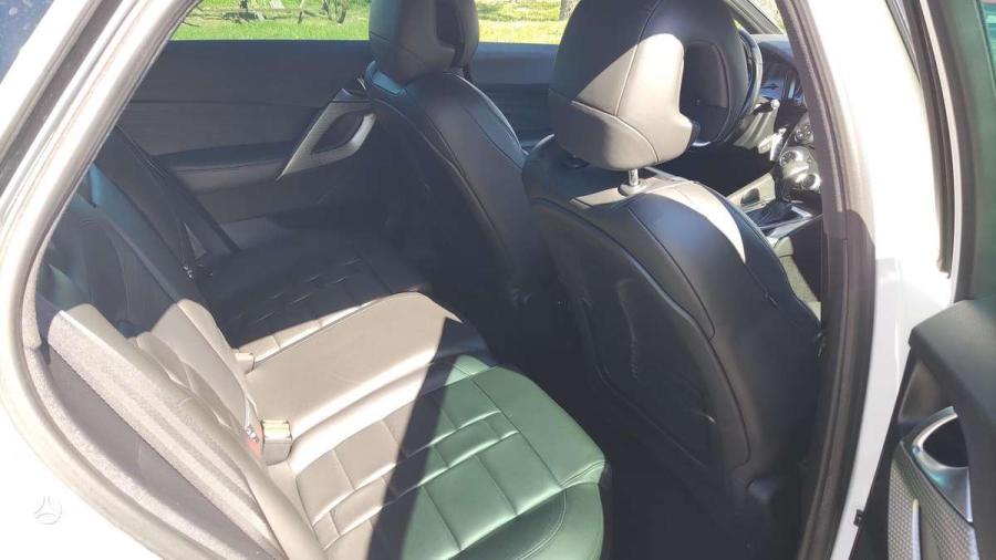 White Citroen DS5 2013 in Klaipeda, with an engine capacity of 2.00 L and mileage of 186 thousand km for 7590 €, photo 24 on AUTOMOTO.COM.LV
