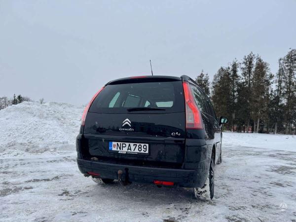 Black Citroen Grand C4 Picasso 2012 in Panevezys, with an engine capacity of 1.56 L and mileage of 342 thousand km for 2350 €, photo 6 on AUTOMOTO.COM.LV