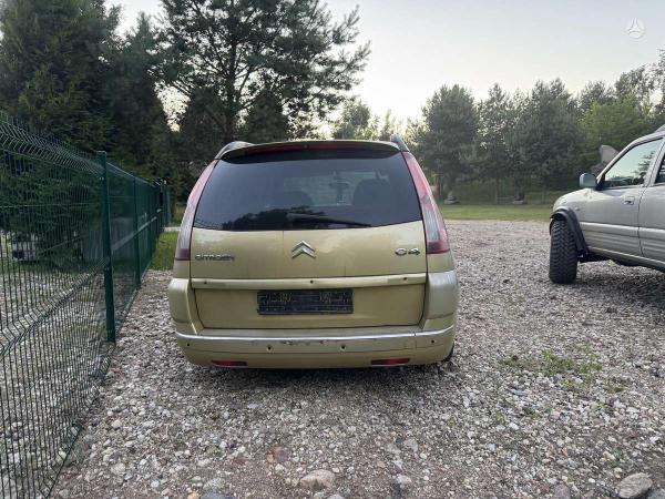 Yellow Citroen Grand C4 Picasso 2009 in Moletai, with an engine capacity of 2.00 L and mileage of 333 thousand km for 430 €, photo 6 on AUTOMOTO.COM.LV