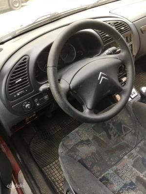 Sarkans Citroen Xsara 2004 Tallina, ar dzinēja tilpumu 1.90 L un nobraukumu 85 tūkst. km par 1300 €, foto 19 vietnē AUTOMOTO.COM.LV