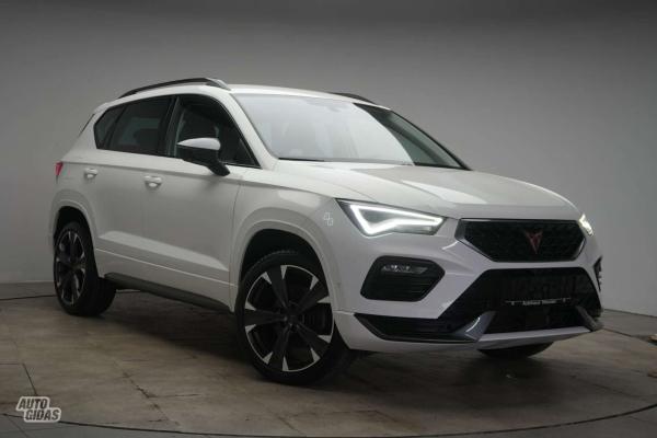 White Cupra ateca 2023 in Kaunas, with an engine capacity of 1.50 L and mileage of 58 thousand km for 31114 €, photo 1 on AUTOMOTO.COM.LV